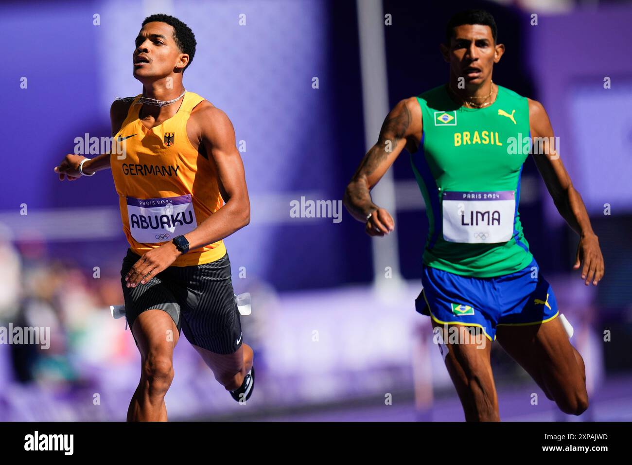 Joshua Abuaku, left, of Germany, leads Matheus Lima, of Brazil, in the ...