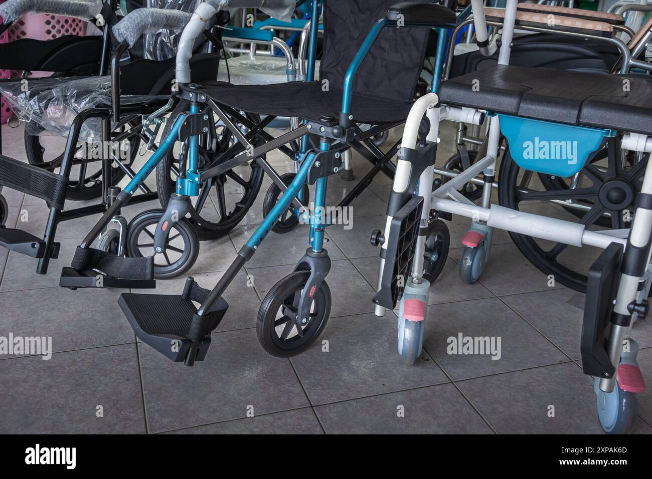 wheelchairs on display in the store. Brand new modern design wheel ...