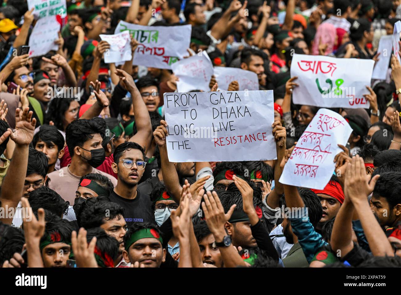 Dhaka, Bangladesh. 03rd Aug, 2024. Bangladeshi students hold placards ...