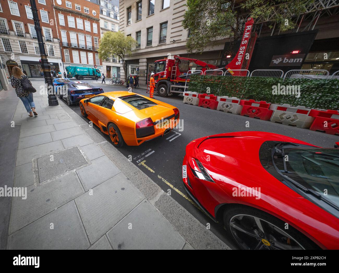 Stratton Street, Mayfair, London, UK. 5th Aug, 2024. A line of six ...