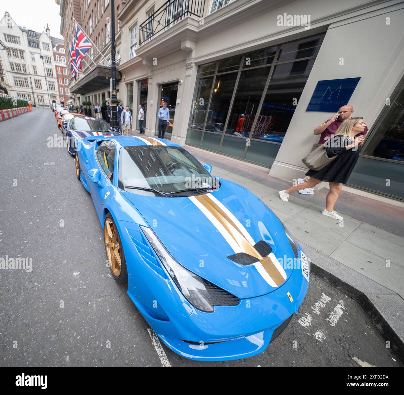 Stratton Street, Mayfair, London, UK. 5th Aug, 2024. A line of six ...