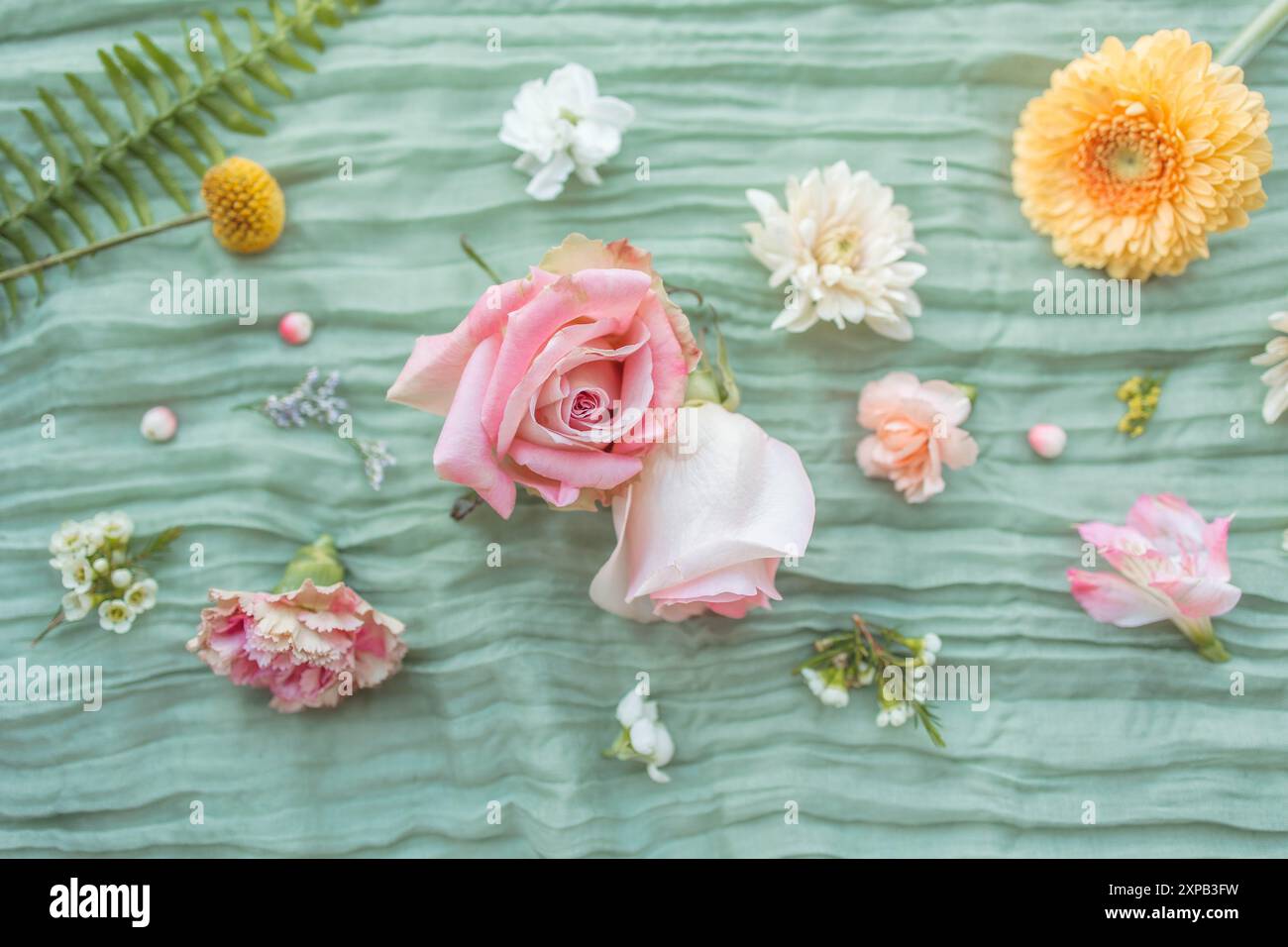 Elegant floral arrangement with pastel roses and ferns in a vase Stock ...