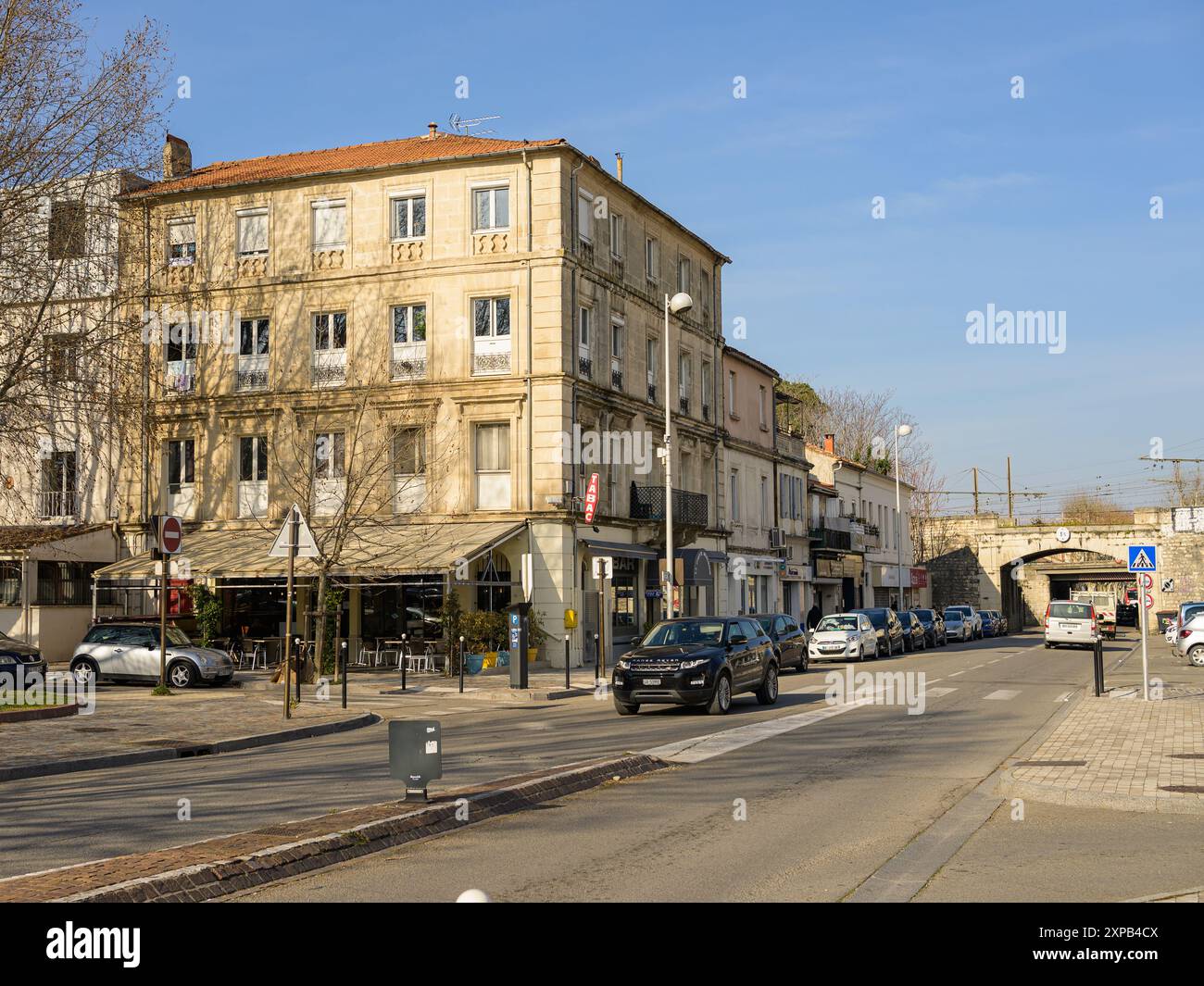 Arles, France - March 1, 2023: Street near the railway station in Arles ...