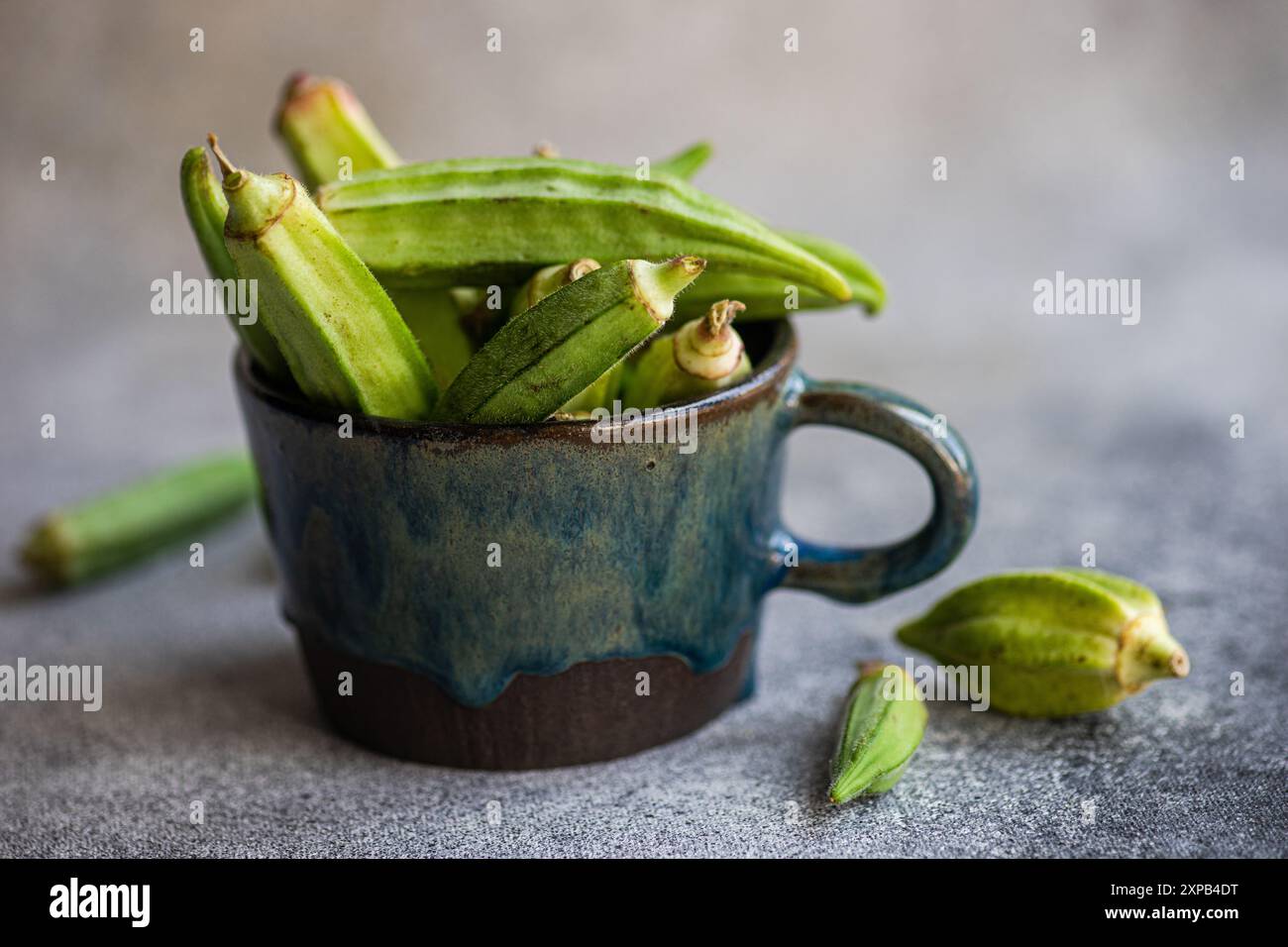 Raw bamia or okra vegetable cooking Stock Photo - Alamy