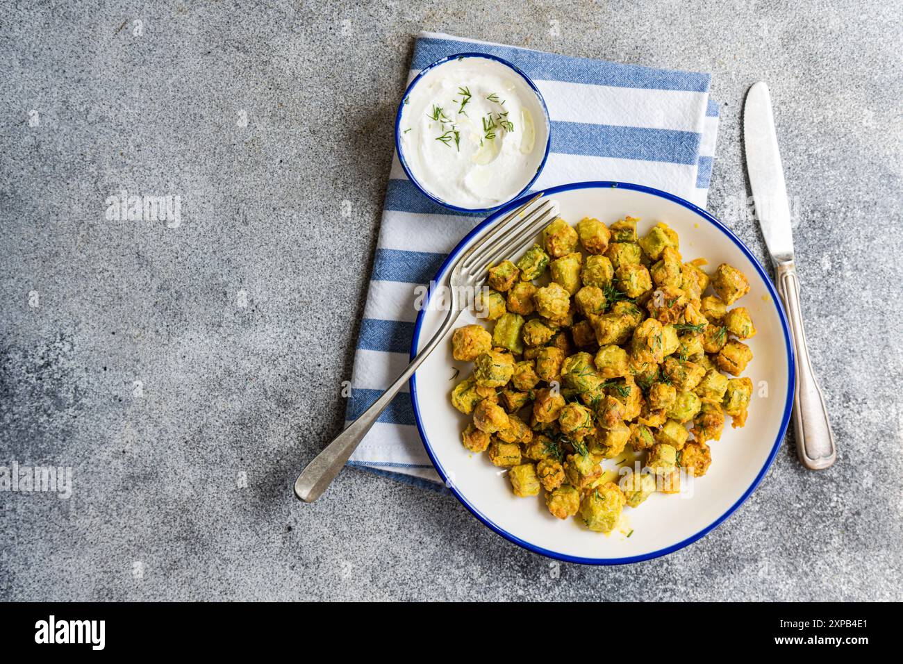 Fried bamia or okra vegetable served with sour cream sauce Stock Photo ...