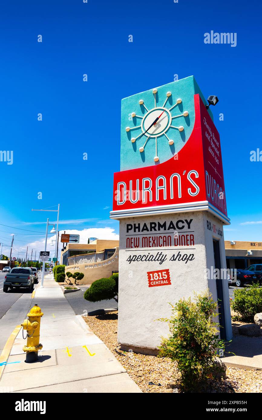 Sign and clock tower for Duran's Pharmacy shop and restaurant ...