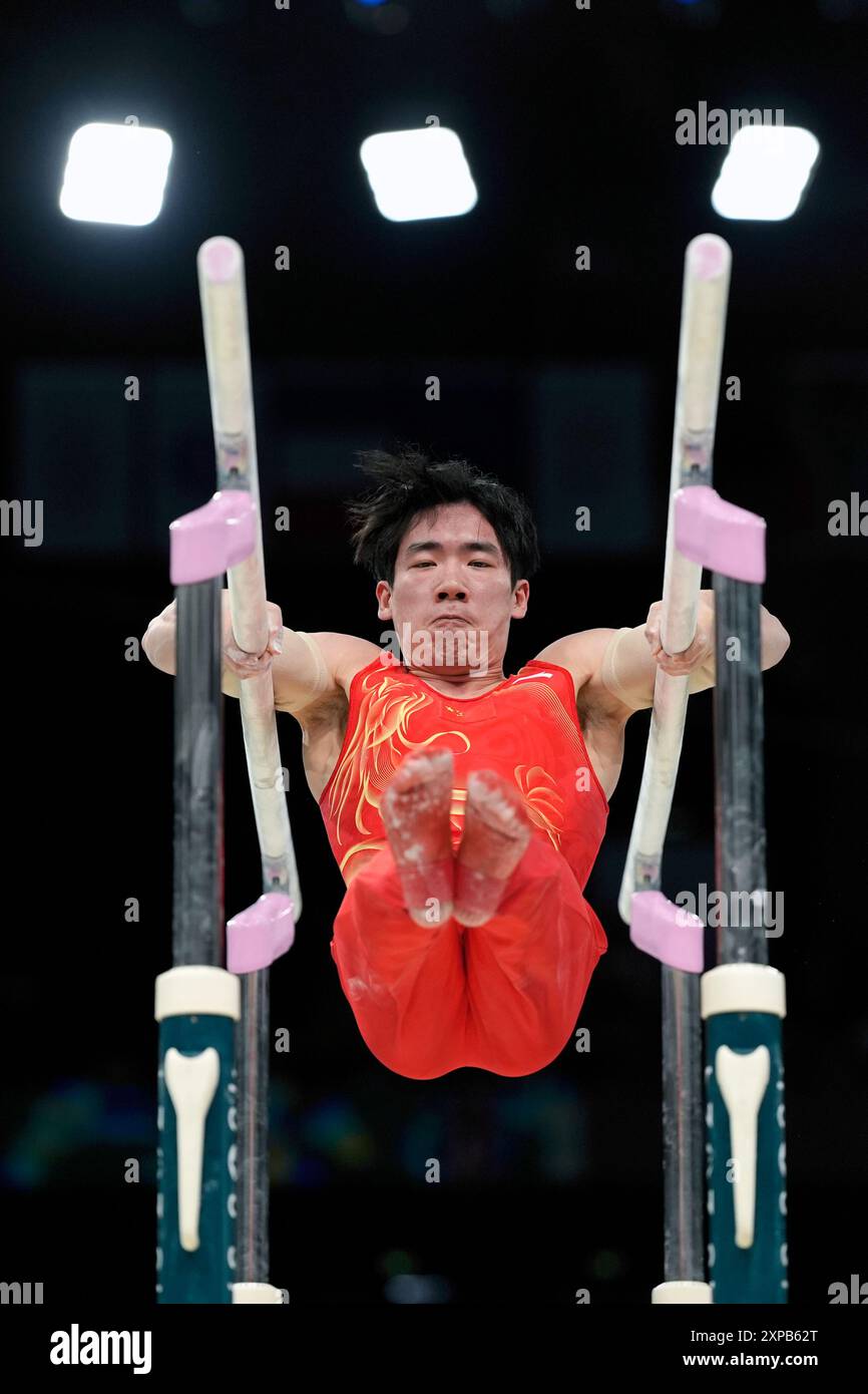 Zhang Boheng, of China, competes during the men's artistic gymnastics ...