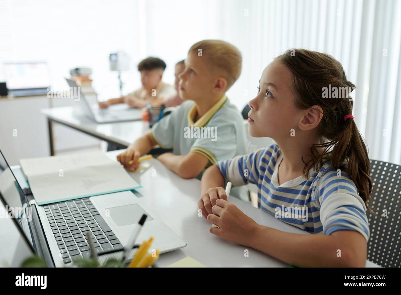 Children Attending Online Learning Session in Classroom Stock Photo - Alamy