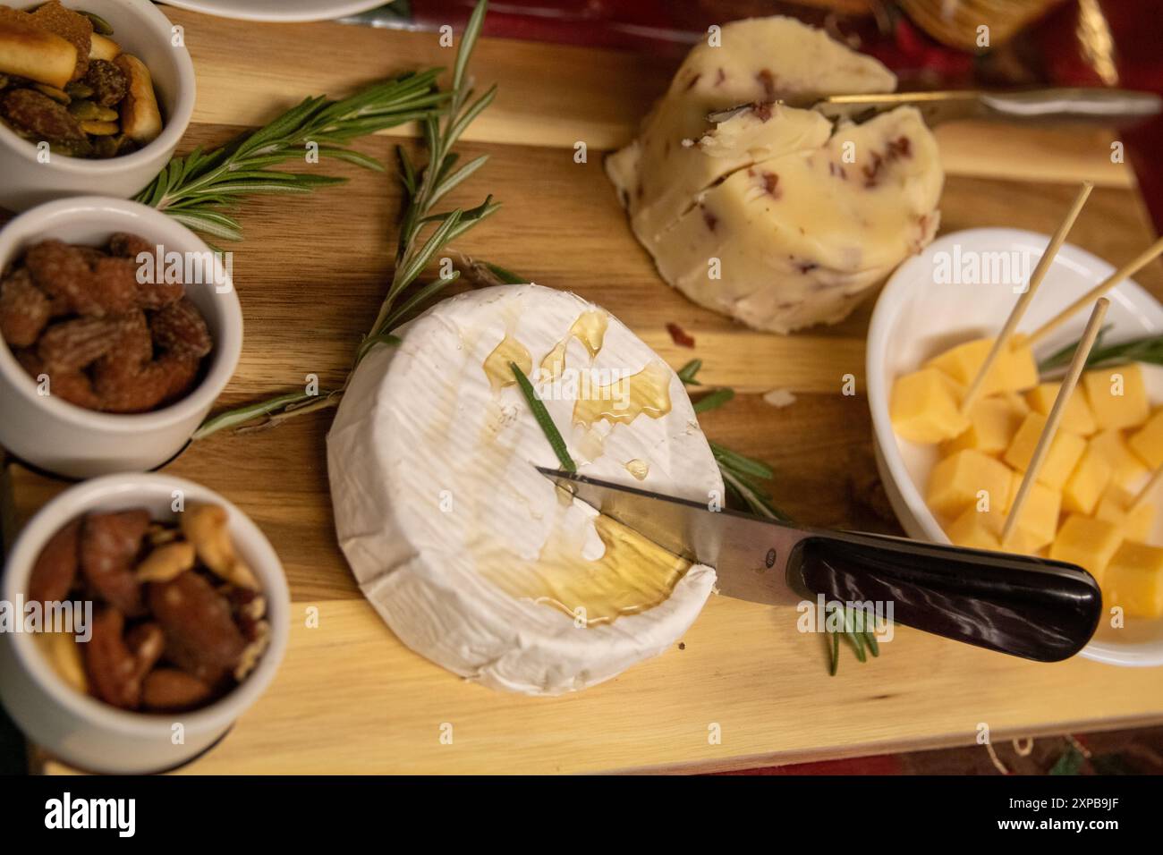 Holiday Cheese and Nuts Board for a party Stock Photo - Alamy