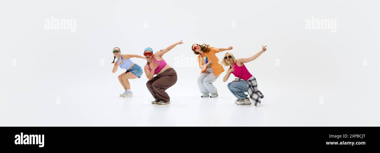 Stylish dancers in colorful attire and sunglasses display their moves ...