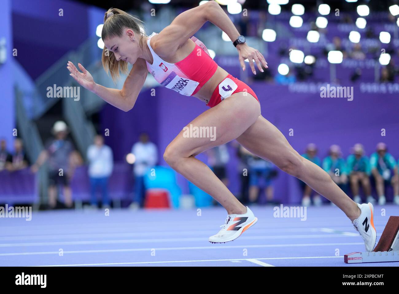 Natalia Kaczmarek, of Poland, competes a heat in the during the women's ...