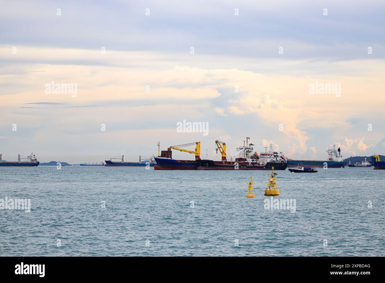 General Cargo and Oil Products Tanker Ship is anchored in Singapore ...