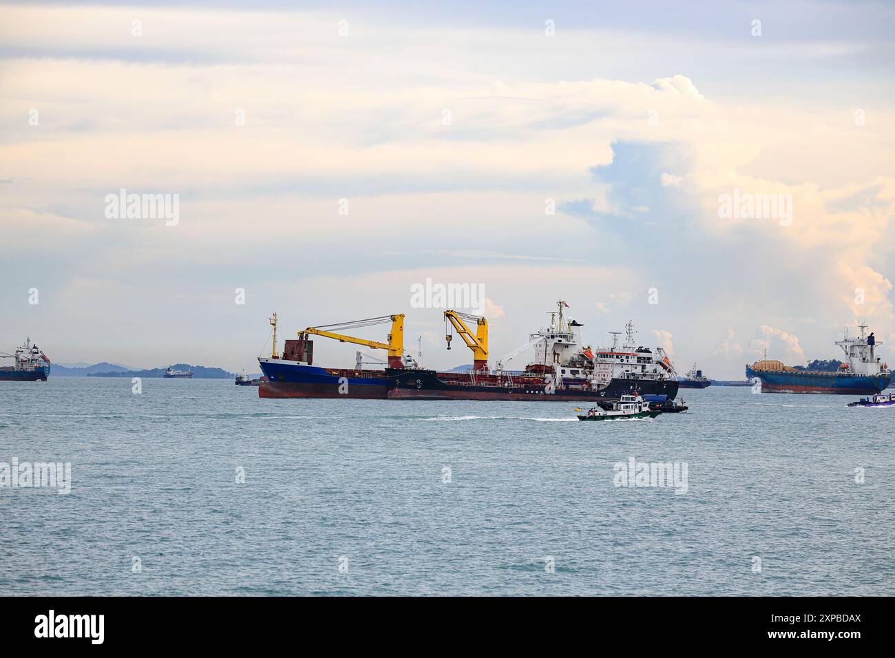 General Cargo and Oil Products Tanker Ship is anchored in Singapore ...