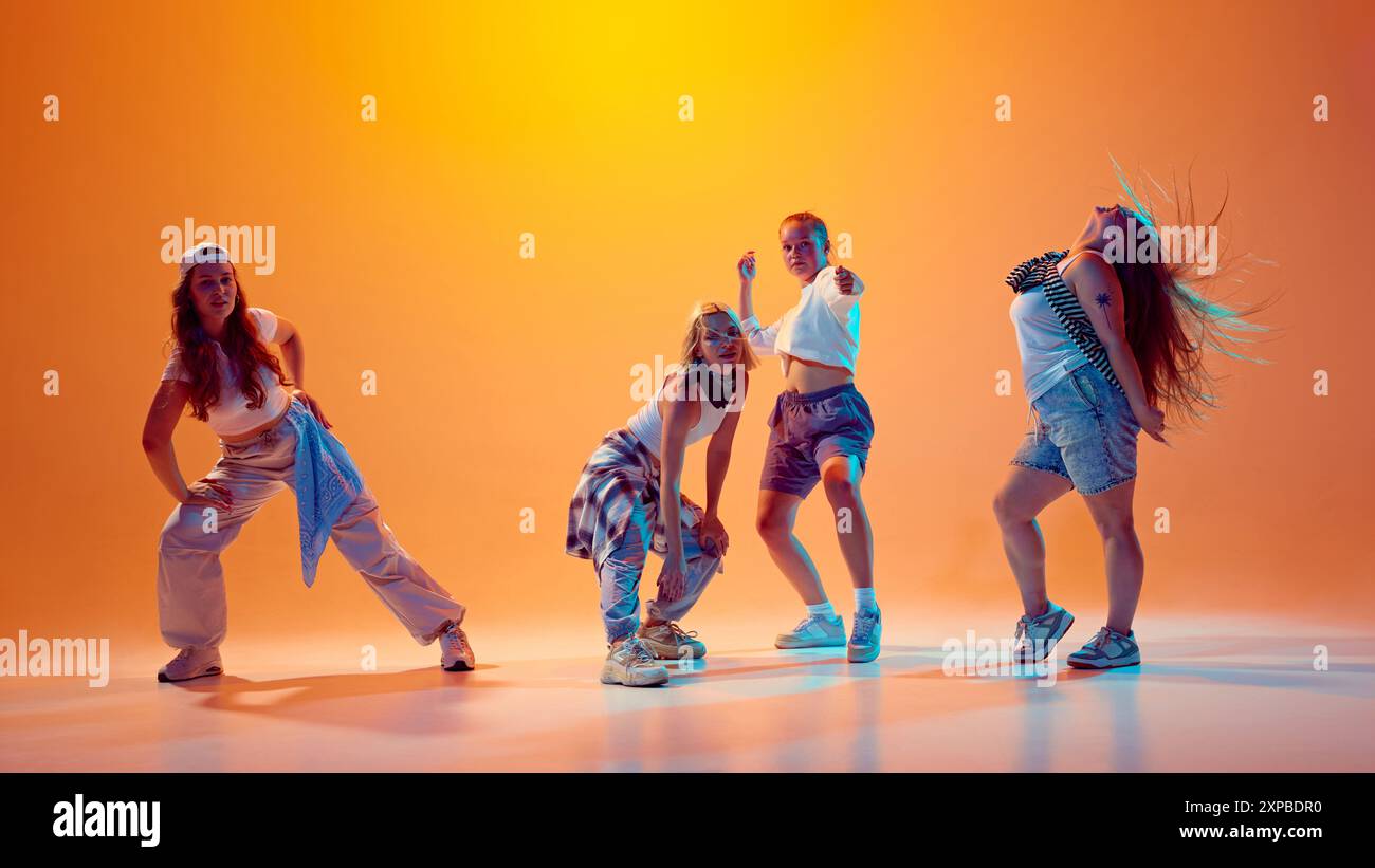 Individuality throw moves. Girls, dancers dancing, posing dressed retro ...