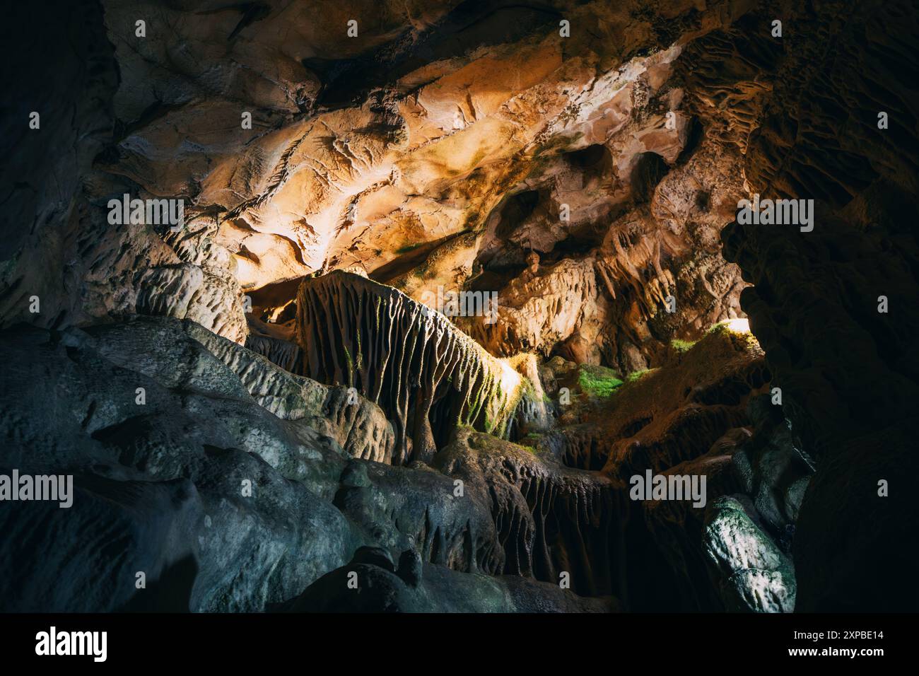 intricate formations of stalactites and stalagmites in a scenic ...
