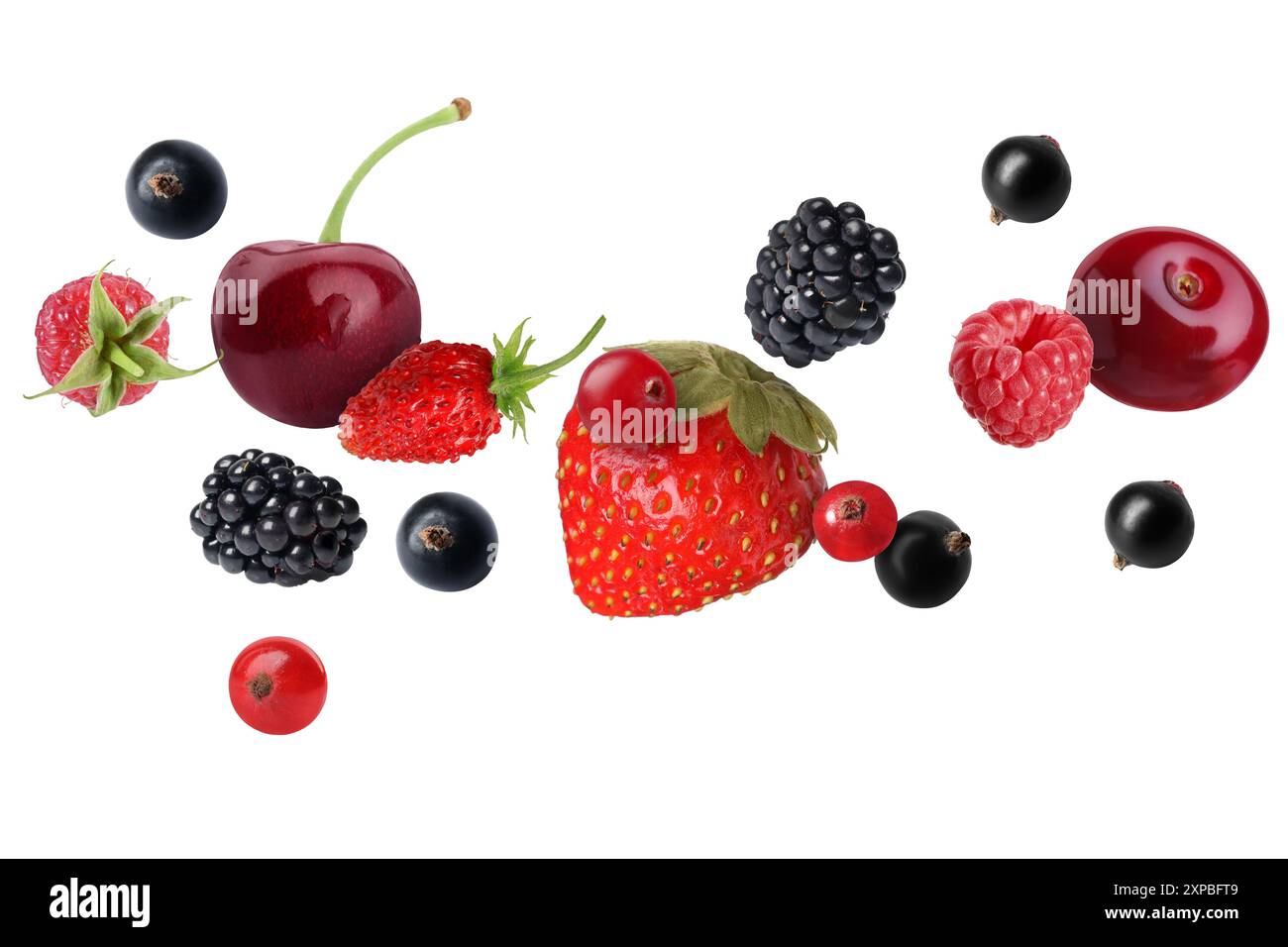 Different fresh berries in air on white background Stock Photo - Alamy