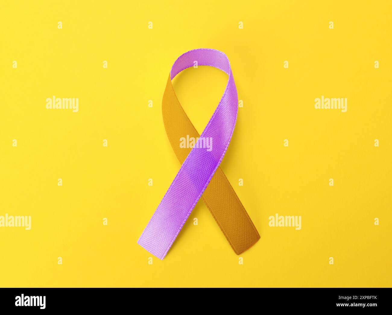 World Psoriasis Day. Orange and orchid awareness ribbon as symbol of ...