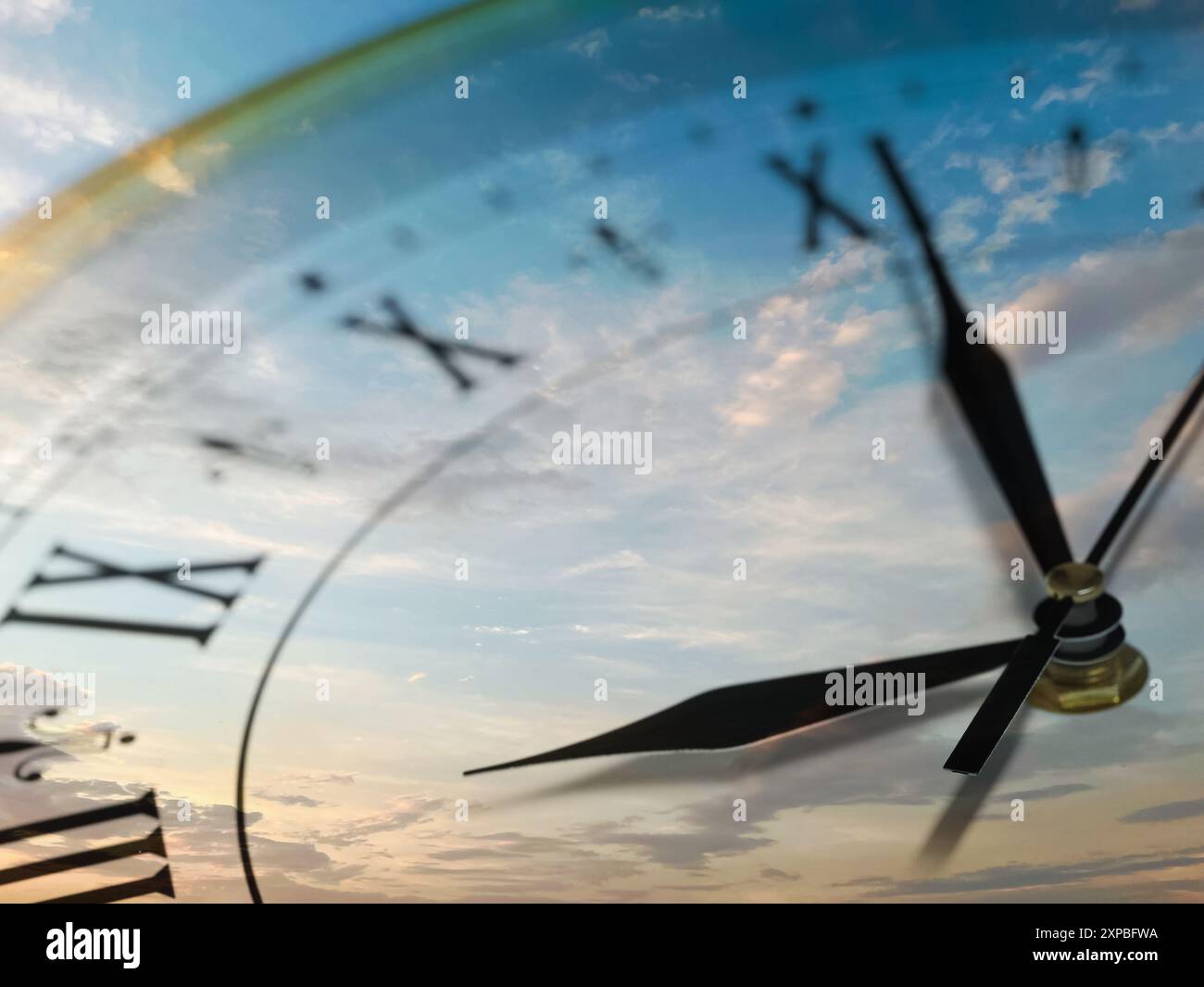 Time concept. Clock and blue sky with fluffy clouds, double exposure ...