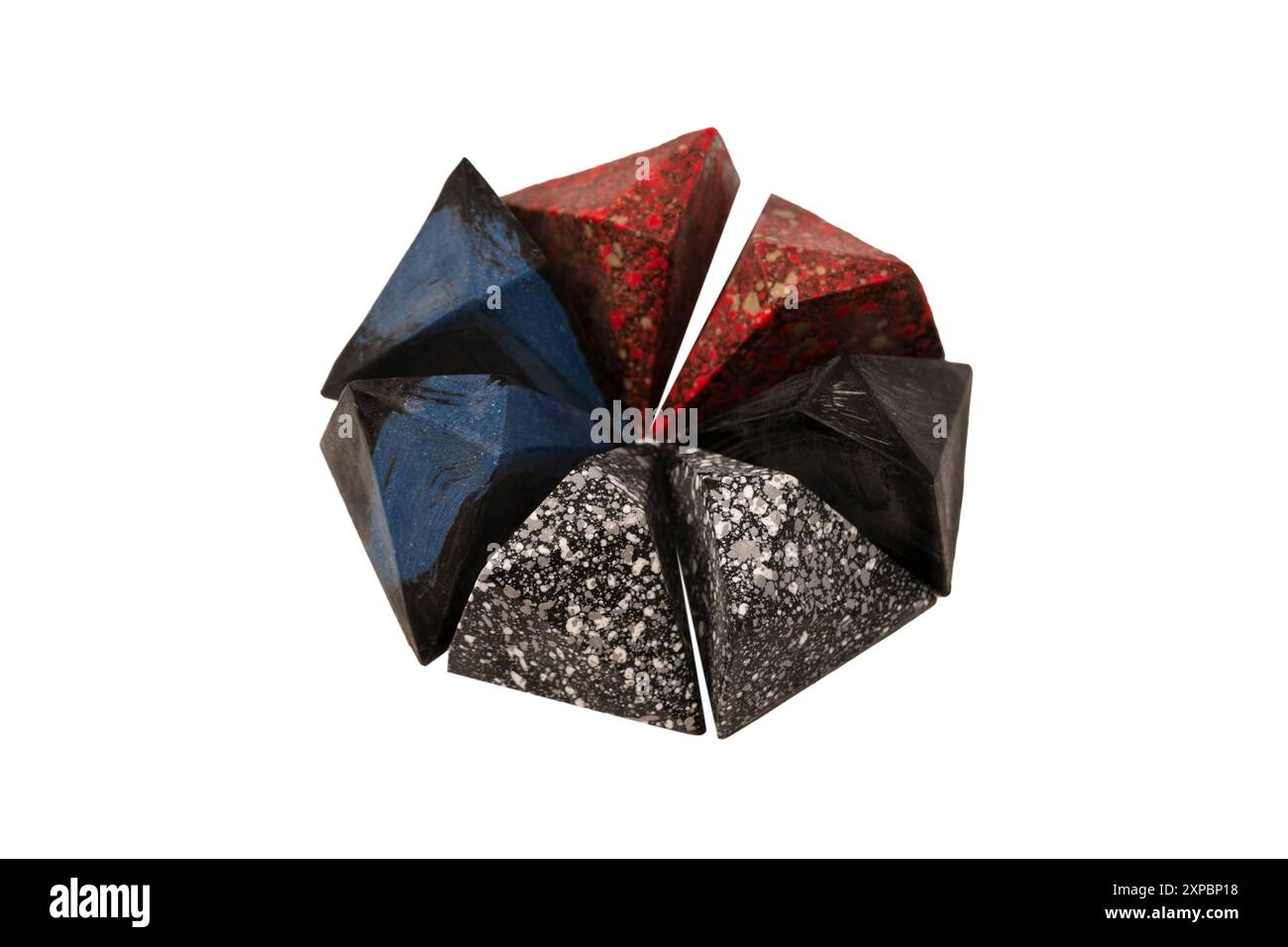 Chocolate candies in the form of precious stones, with marble texture ...