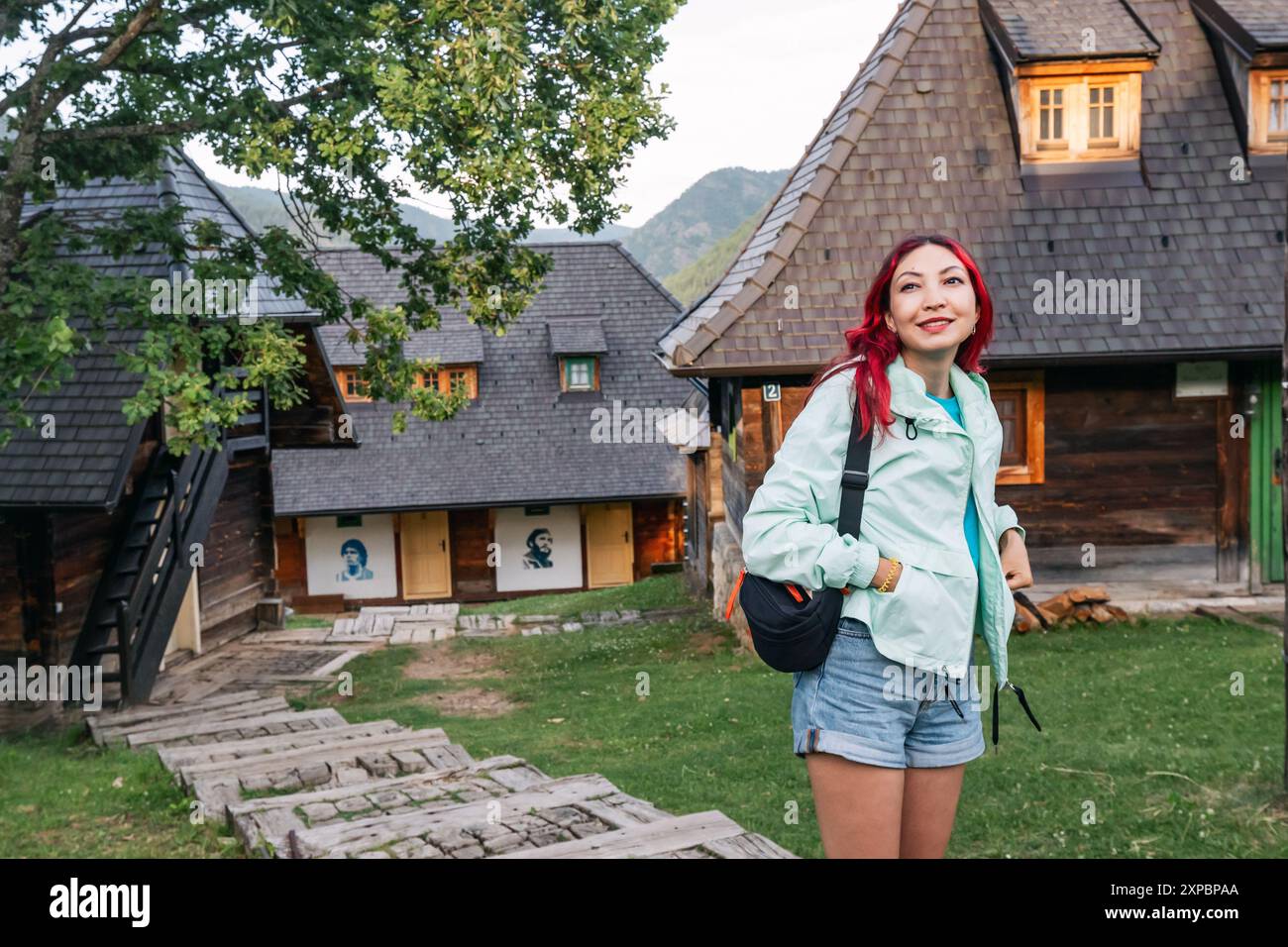 10 June 2024, Mokra Gora, Serbia: Female traveler enjoying her vacation ...