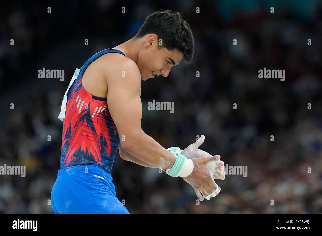 Angel Barajas, of Colombia, celebrates after completing his routine in ...