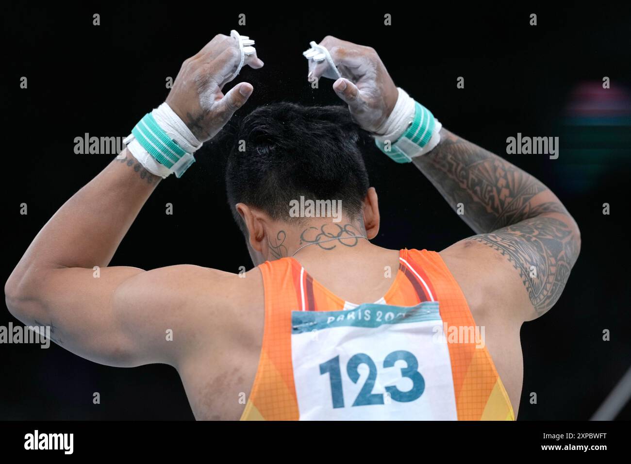 Marios Georgiou, of Cyprus, reacts after falling during the men's ...