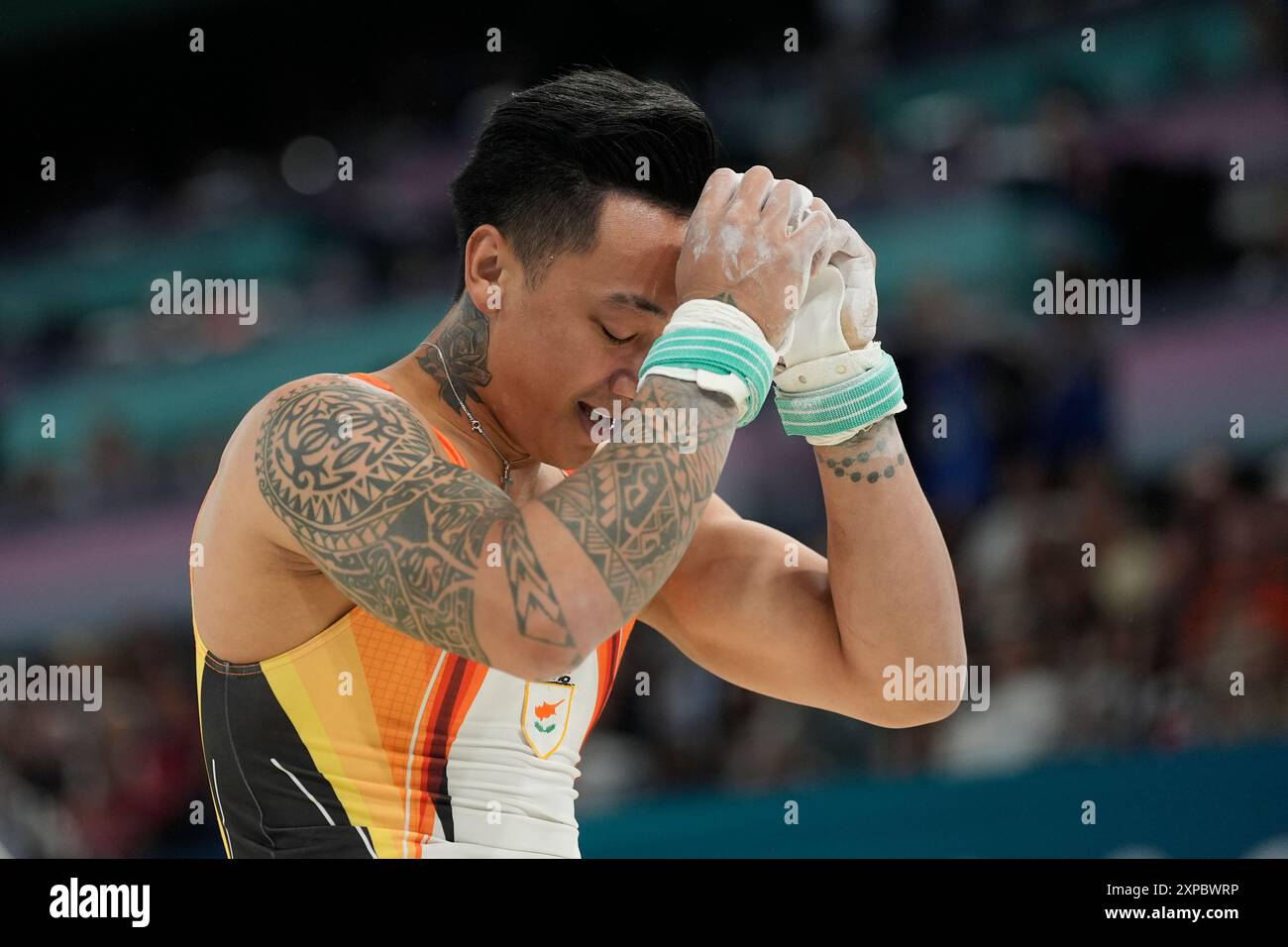 Marios Georgiou, of Cyprus, reacts after falling during the men's ...