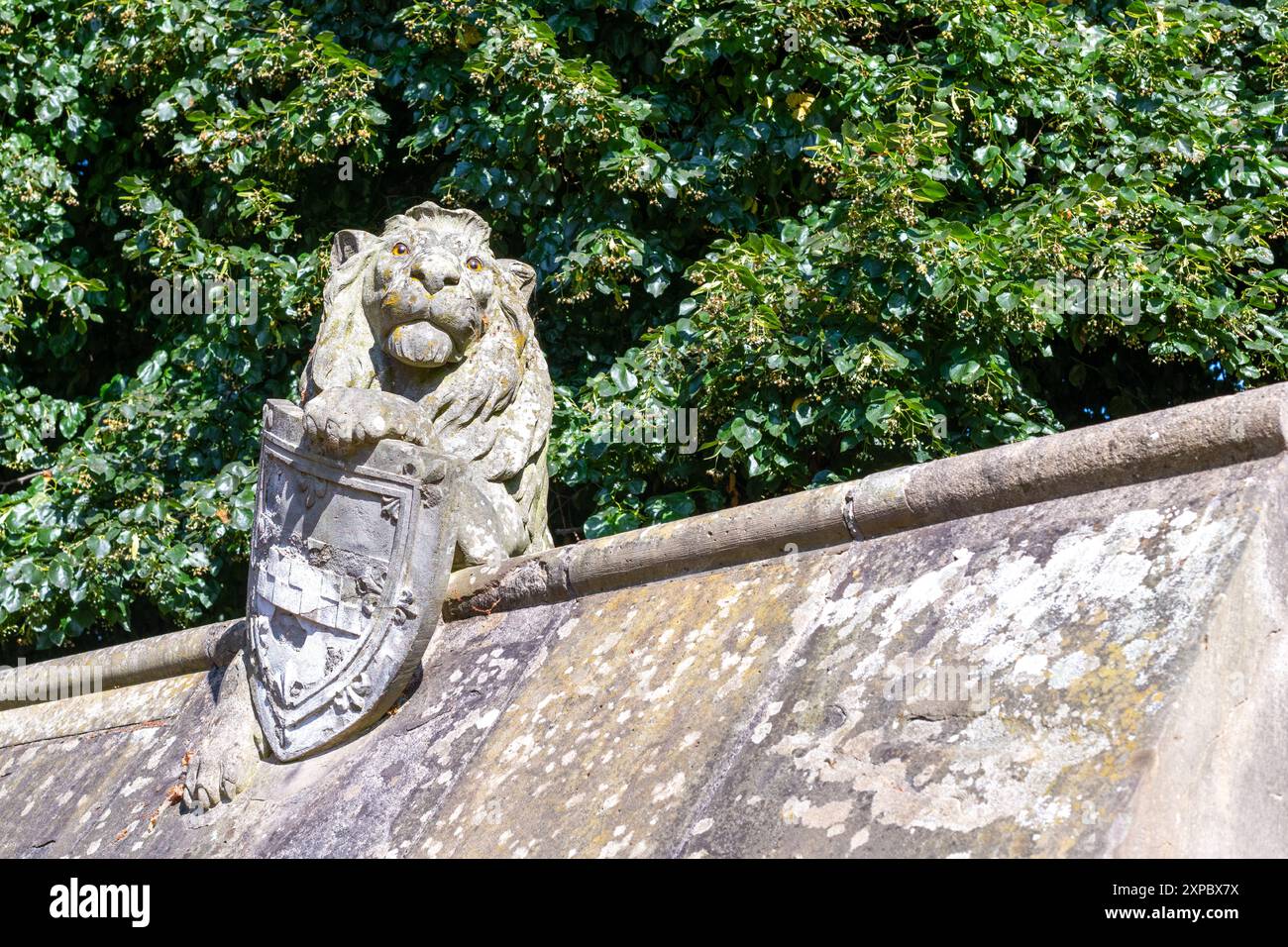 Stone lion with heraldic shield on Animal Walk, Bute Park, Cardiff UK ...