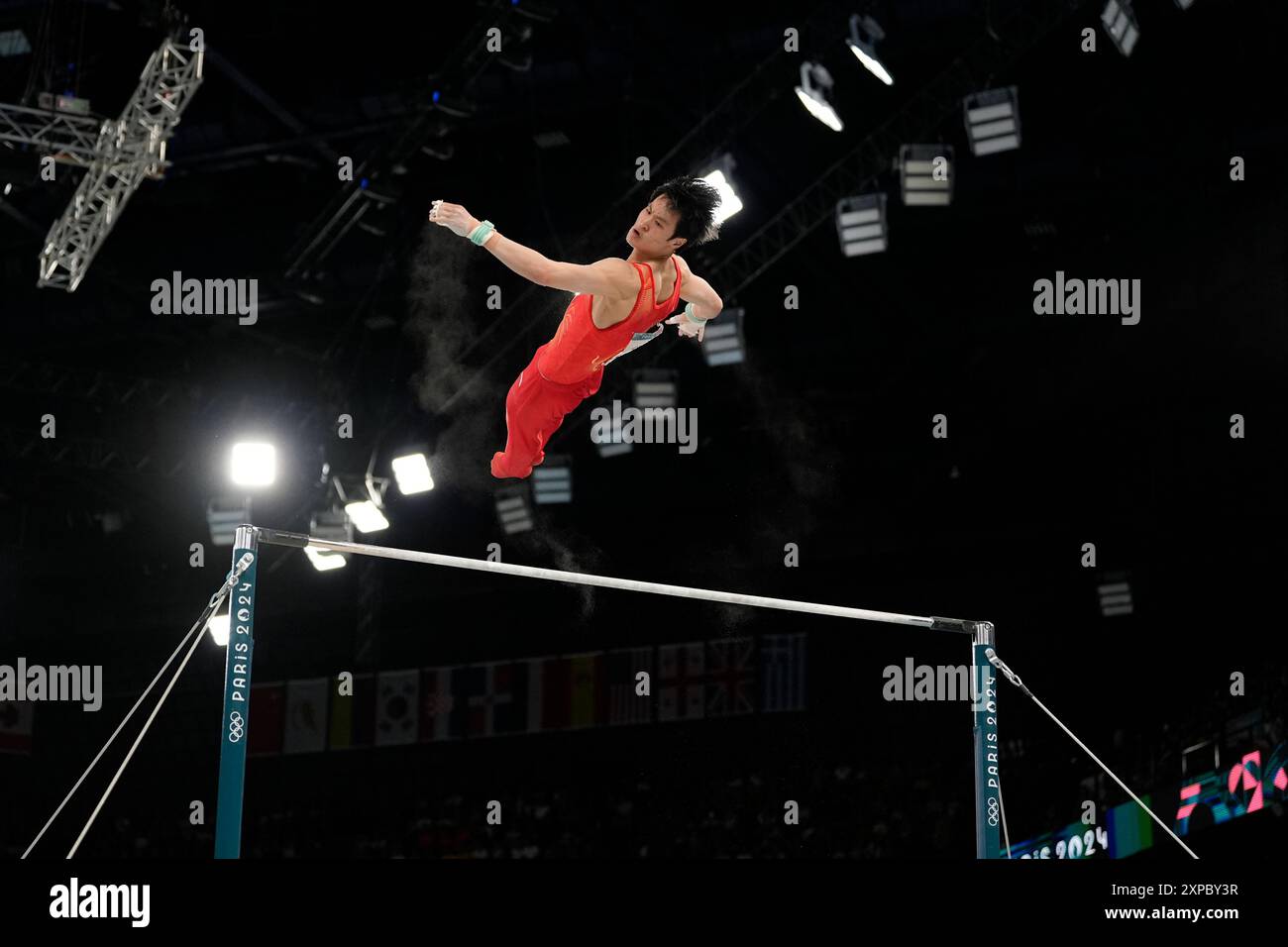 Su Weide, of China, competes during the men's artistic gymnastics ...