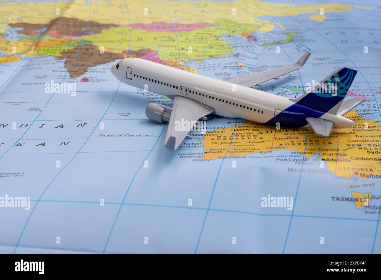 Jetliner on world map. Journey Across Continents. Planning for a trip ...