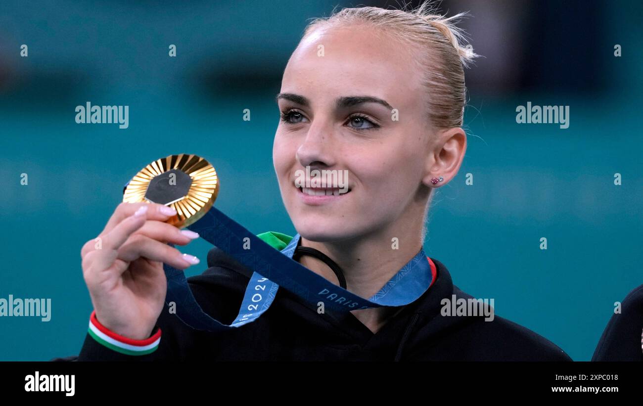 Alice D'Amato, of Italy, celebrates after winning the gold medal during ...