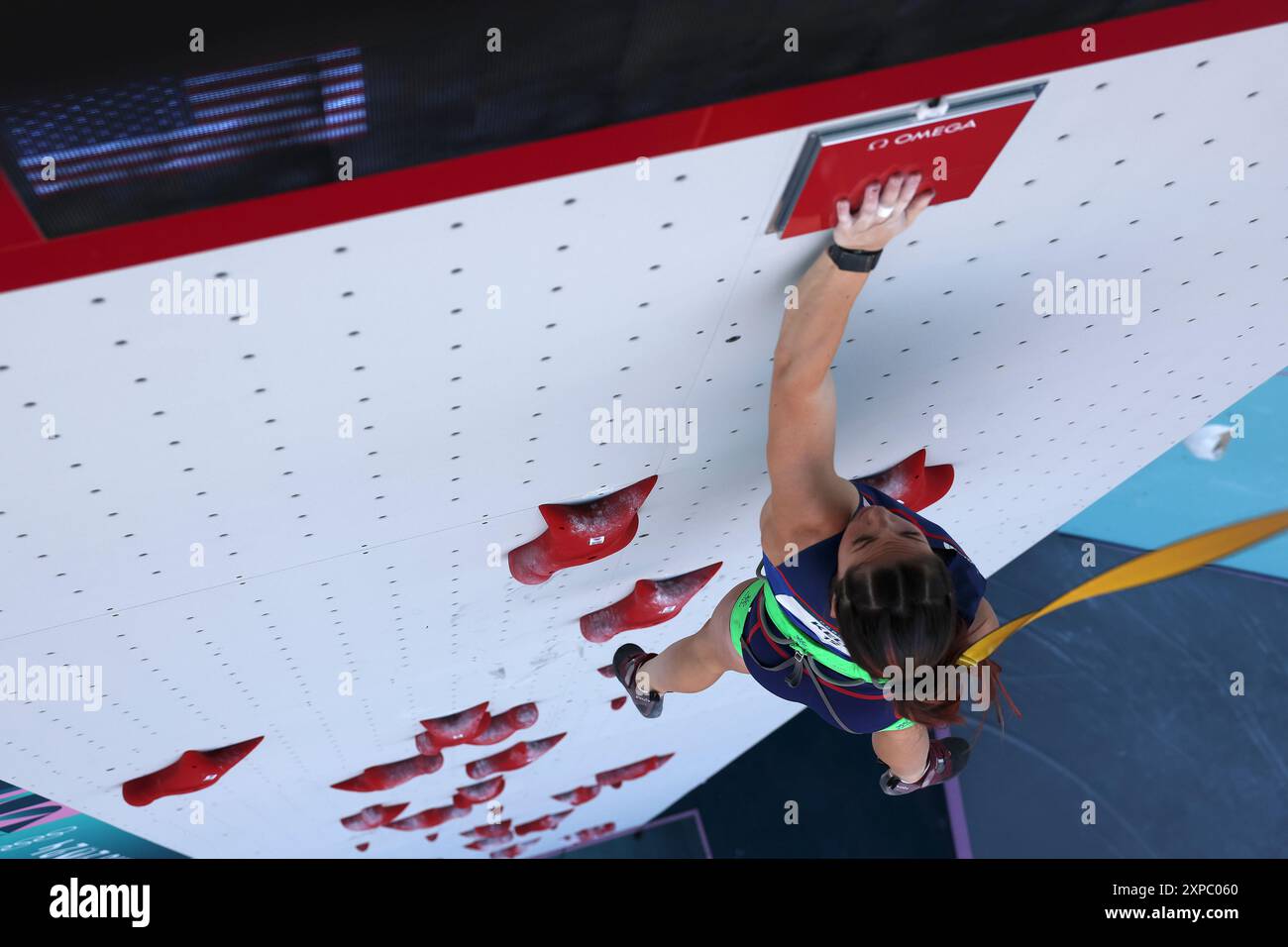 Piper Kelly of the United States touches in to finish her climb in the ...