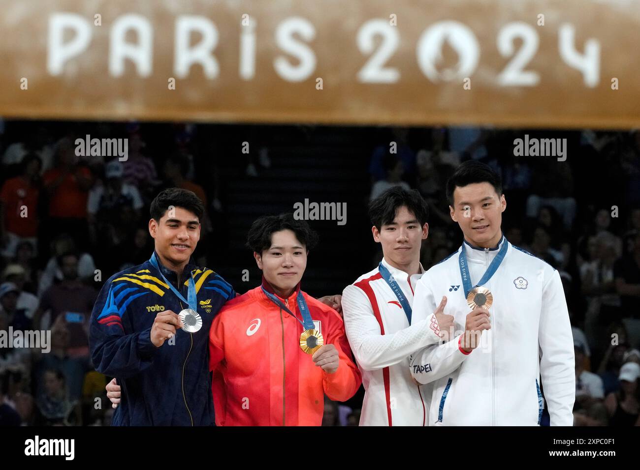 From left to right, silver medalist Angel Barajas, of Colombia, gold ...