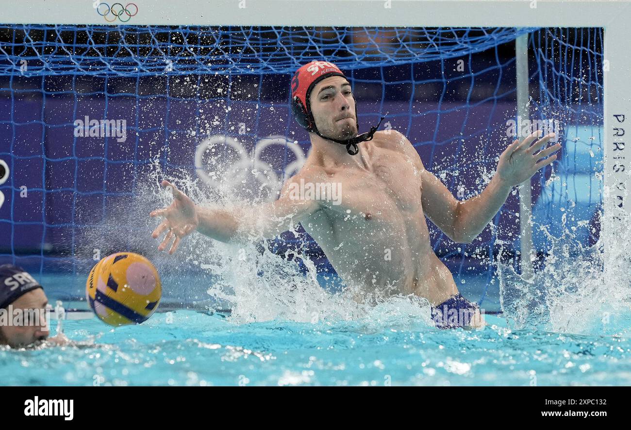 Saint Denis. 5th Aug, 2024. Goalkeeper Vladimir Misovic (R) of Serbia ...