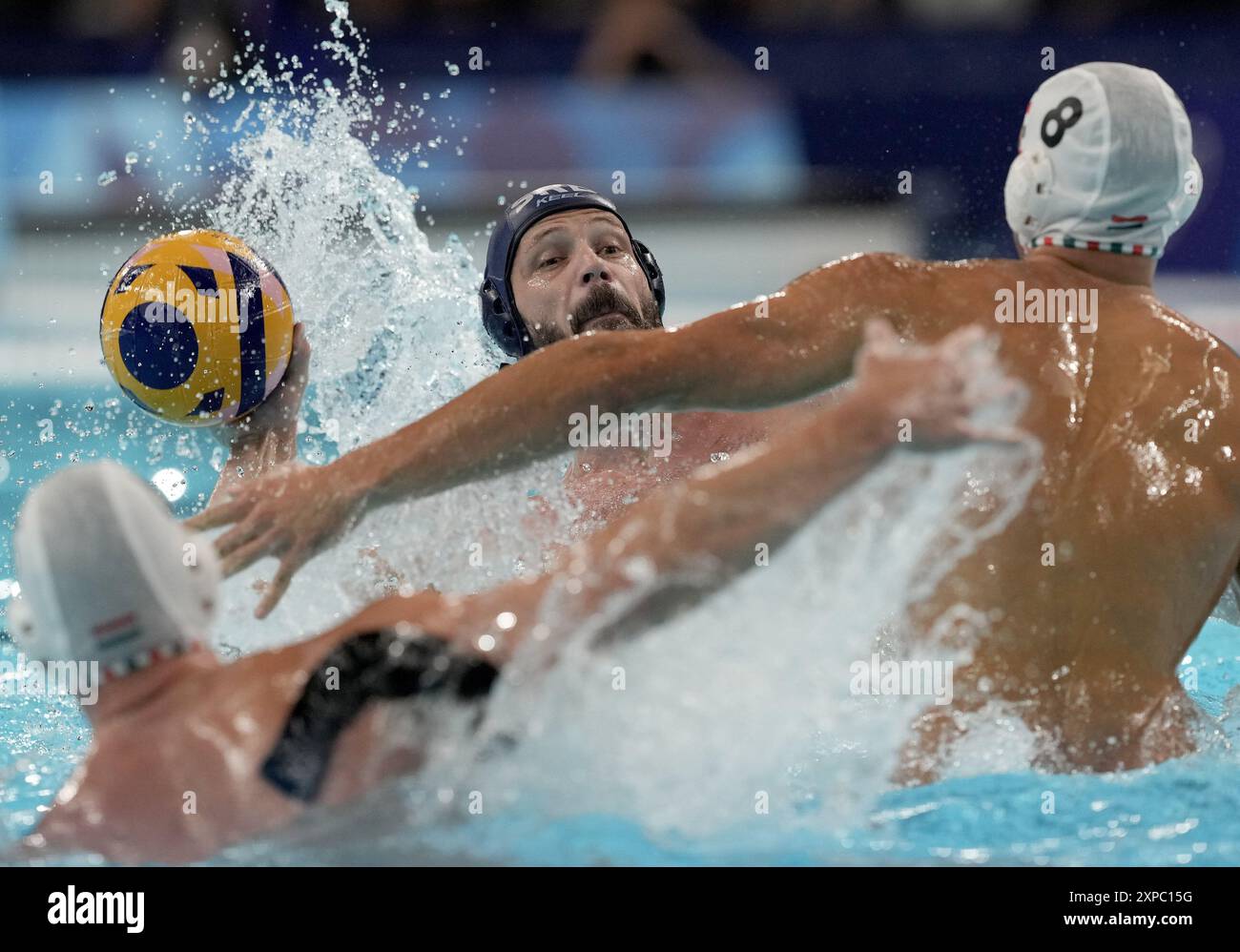 Saint Denis. 5th Aug, 2024. Nikola Dedovic (C) of Serbia competes ...