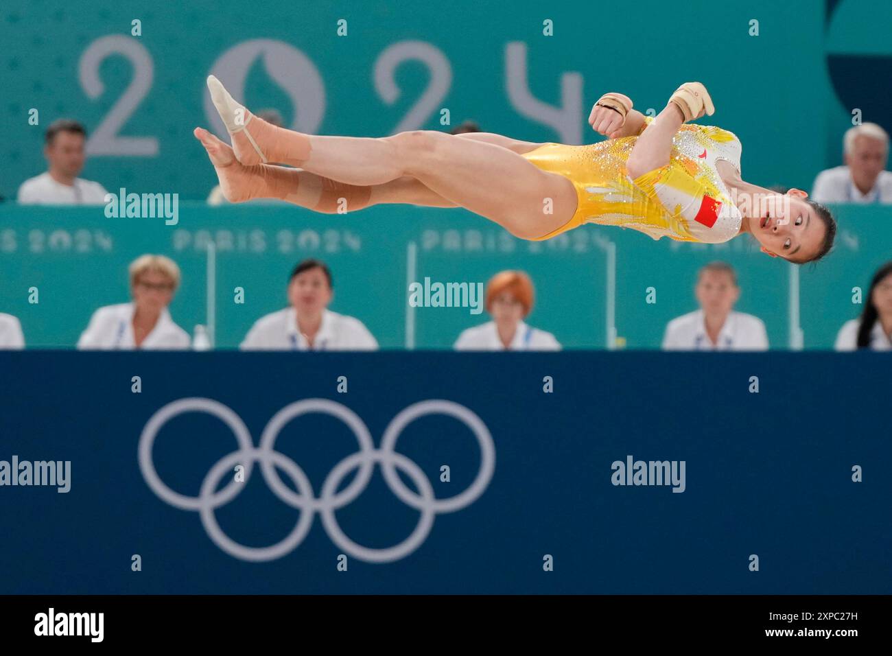 Ou Yushan, of China, competes during the women's artistic gymnastics ...