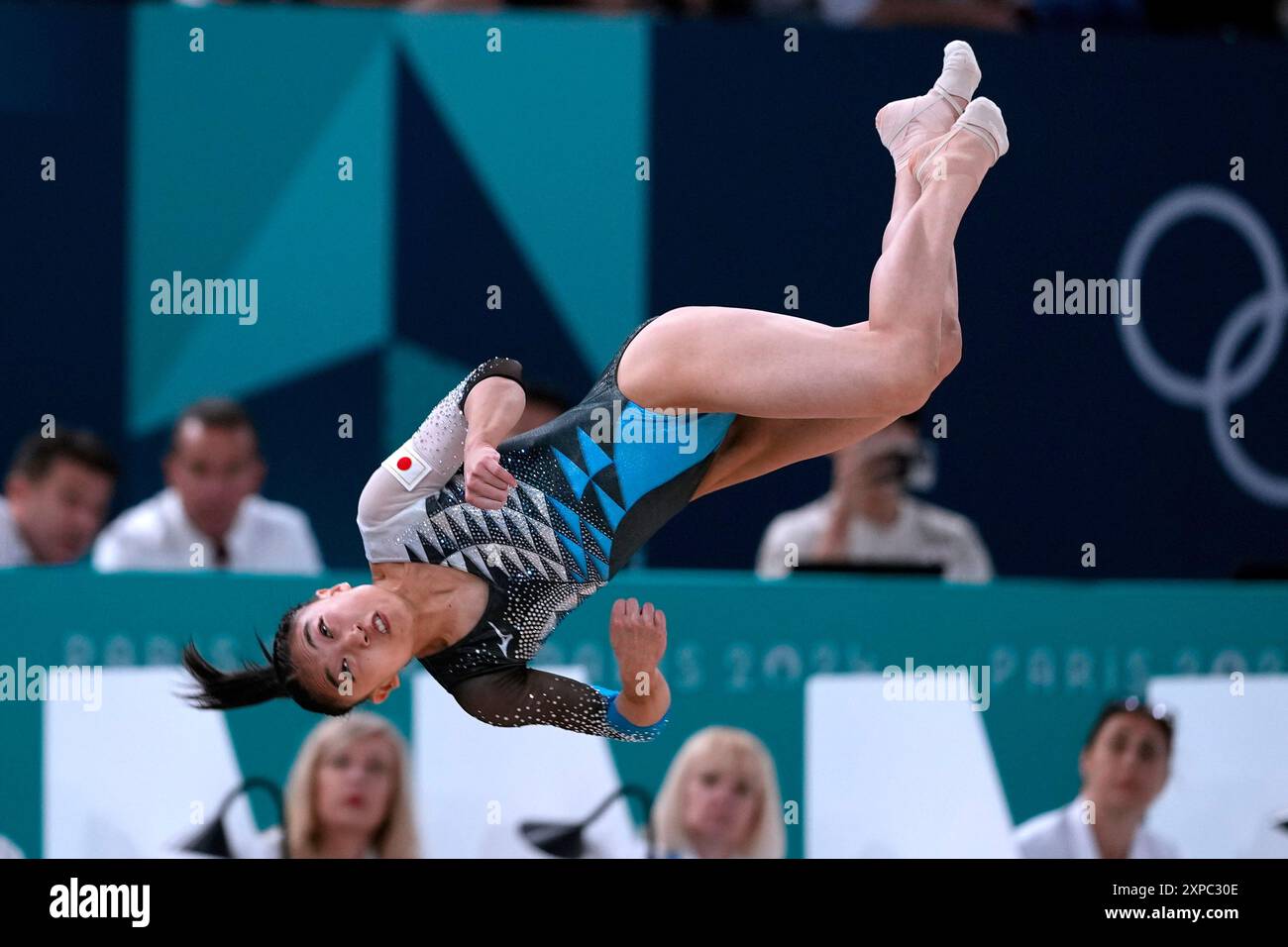 Rina Kishi, of Japan, competes during the women's artistic gymnastics ...