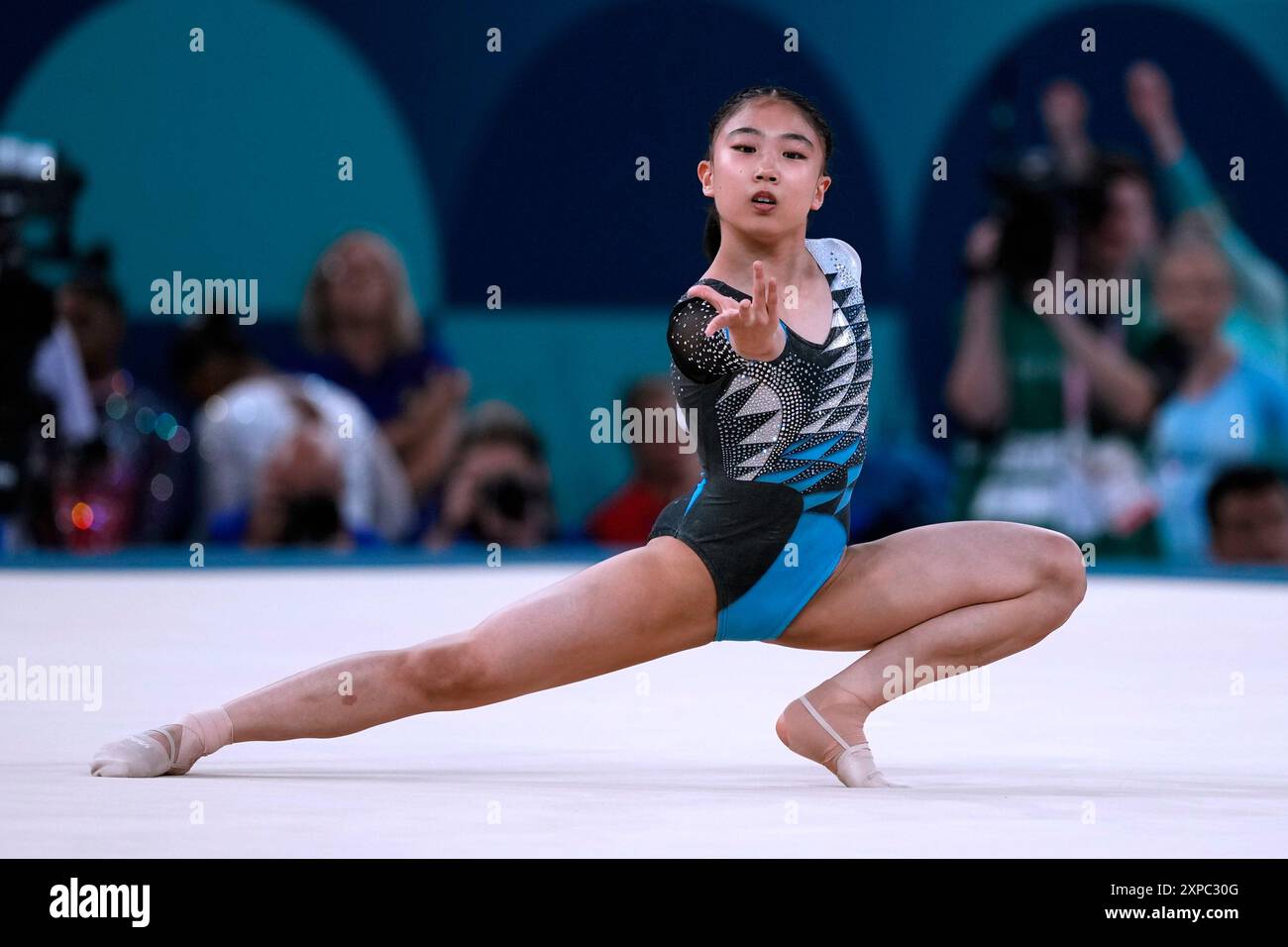 Rina Kishi, of Japan, competes during the women's artistic gymnastics ...