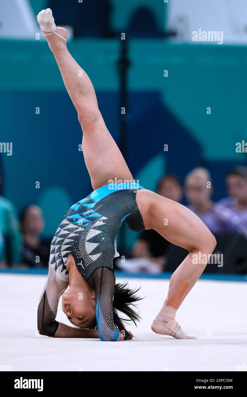 Rina Kishi, of Japan, competes during the women's artistic gymnastics ...