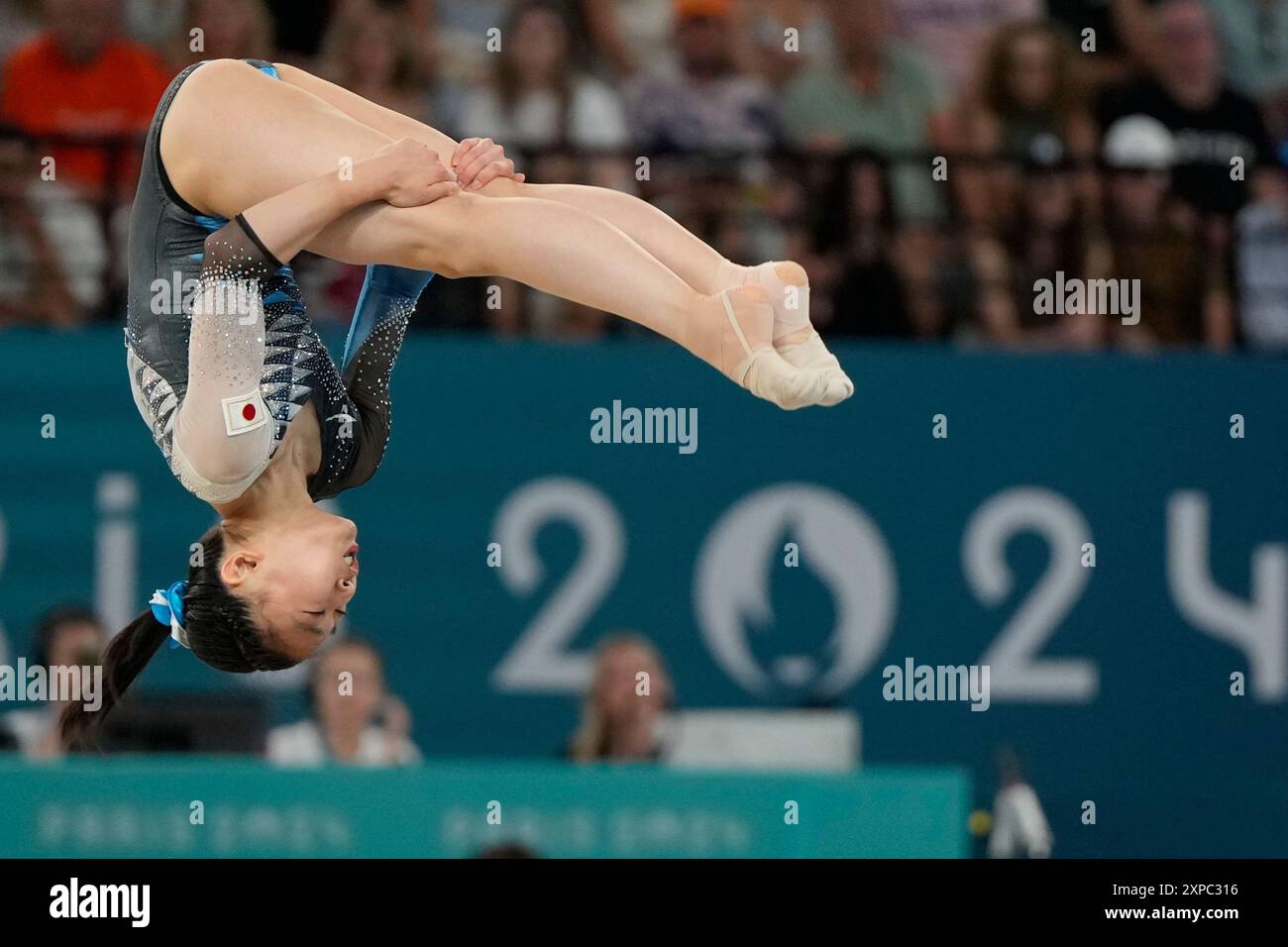 Rina Kishi, of Japan, competes during the women's artistic gymnastics ...