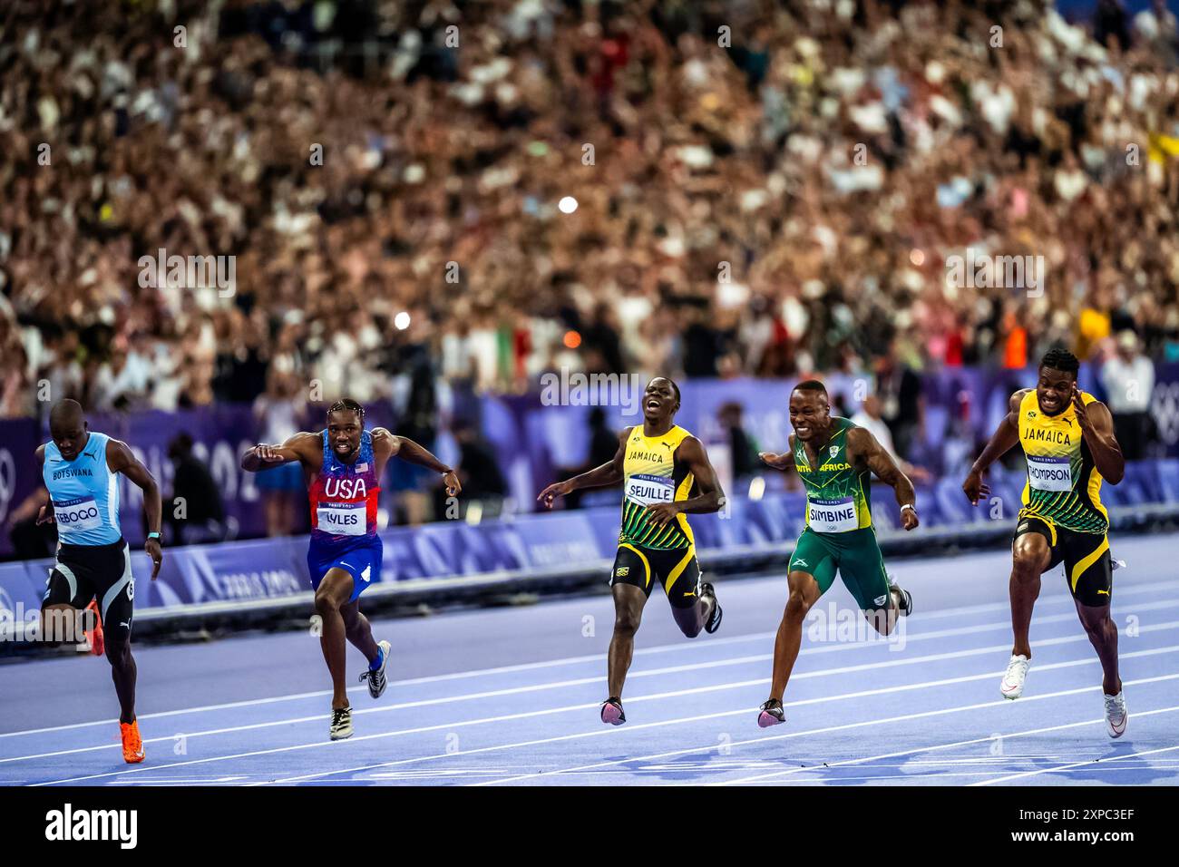 Noah Lyles (USA) wins the gold medal with Kishane Thompson (JAM) far ...