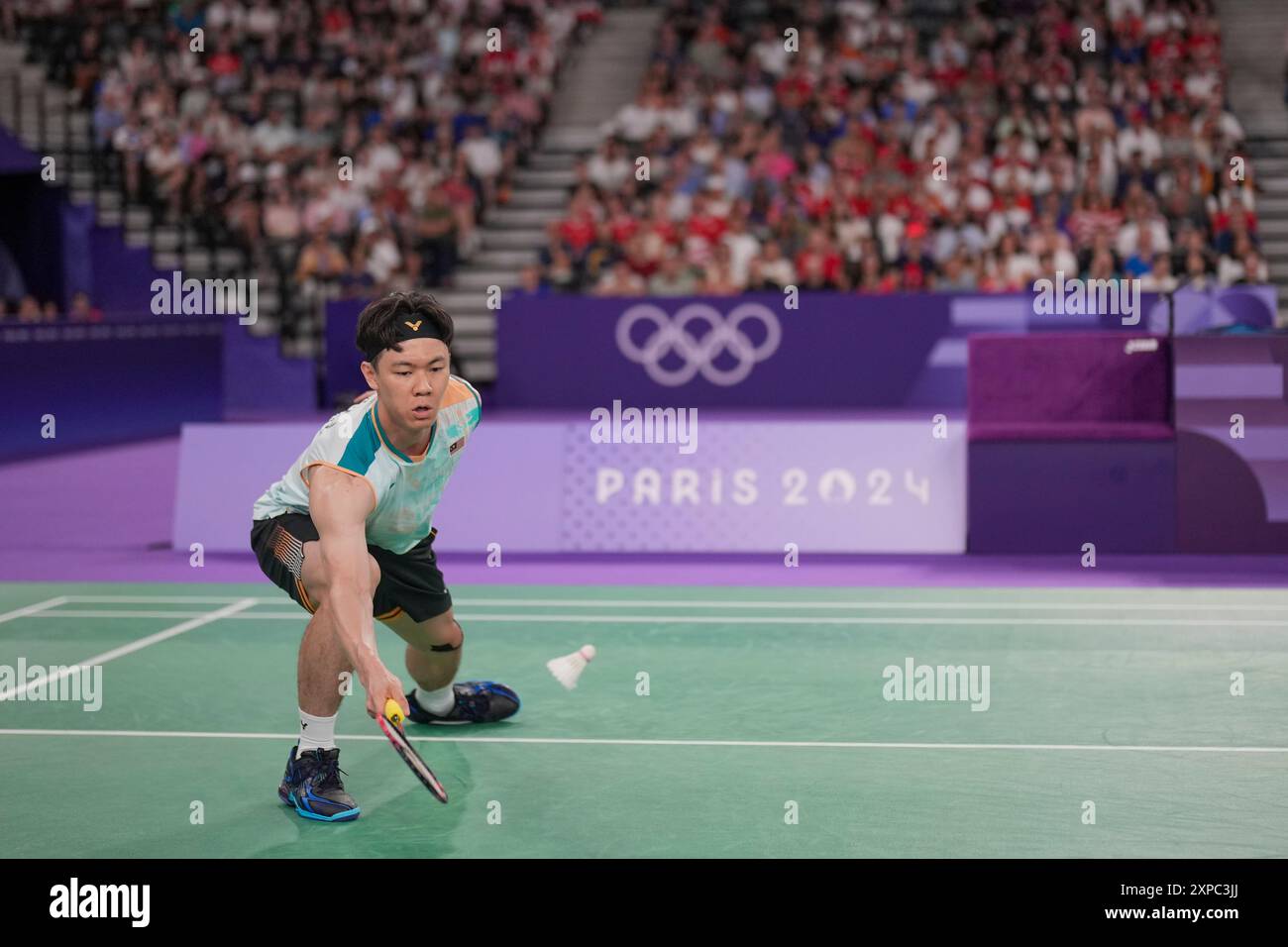 Malaysia's Lee Zii Jia plays against India's Lakshya Sen during their men's singles badminton ...