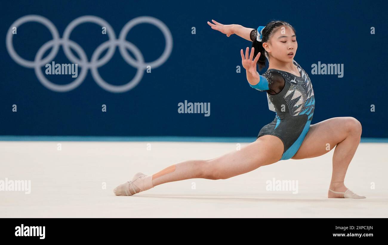 Rina Kishi, of Japan, competes during the women's artistic gymnastics ...