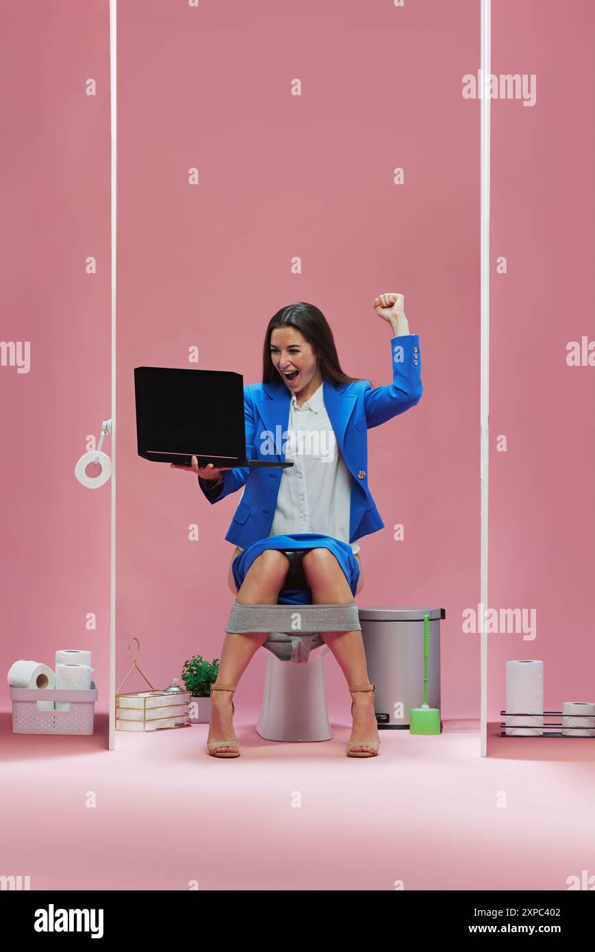 Woman on toilet laptop hi-res stock photography and images - Alamy