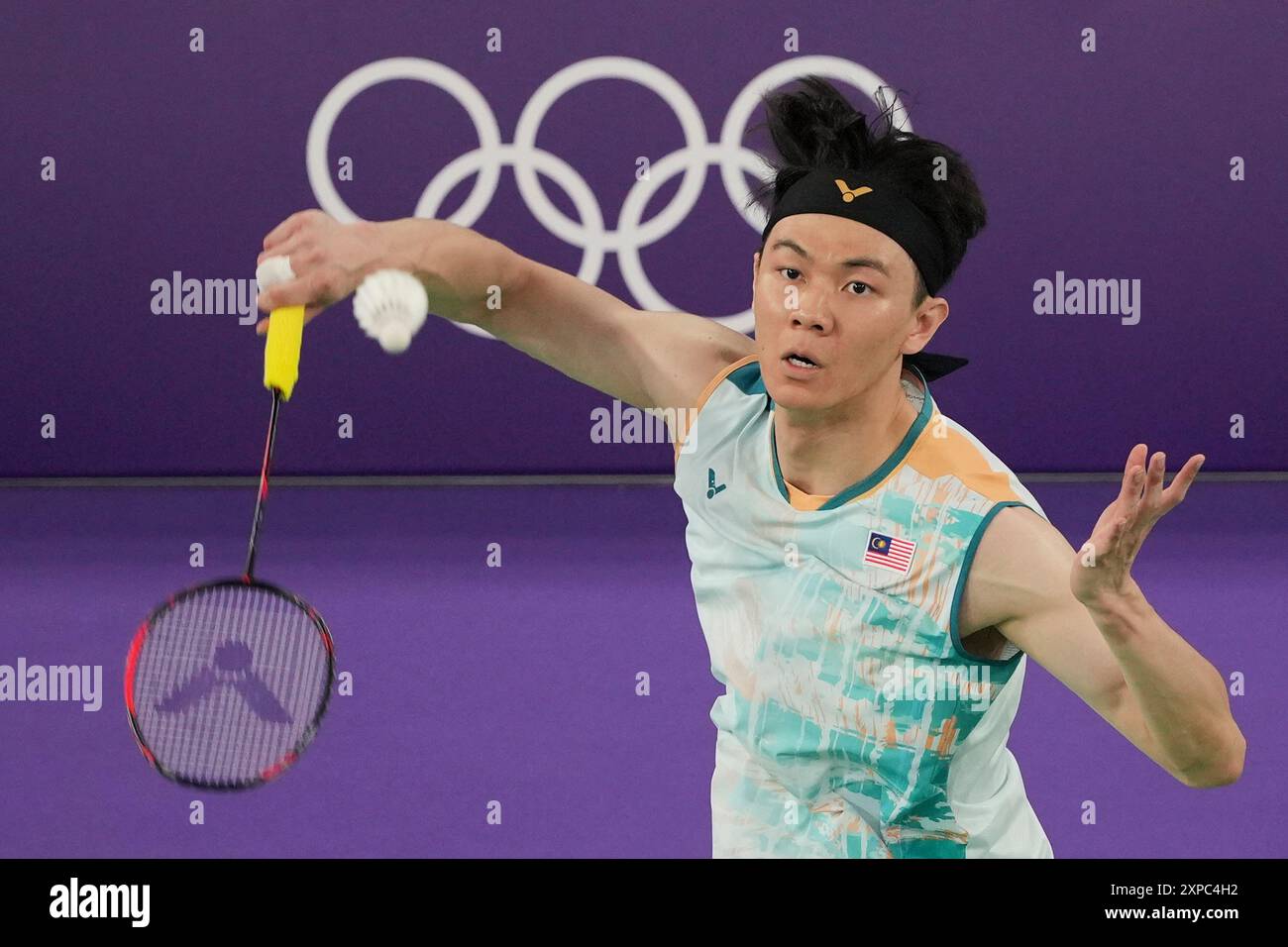 Malaysia's Lee Zii Jia plays against India's Lakshya Sen during their ...