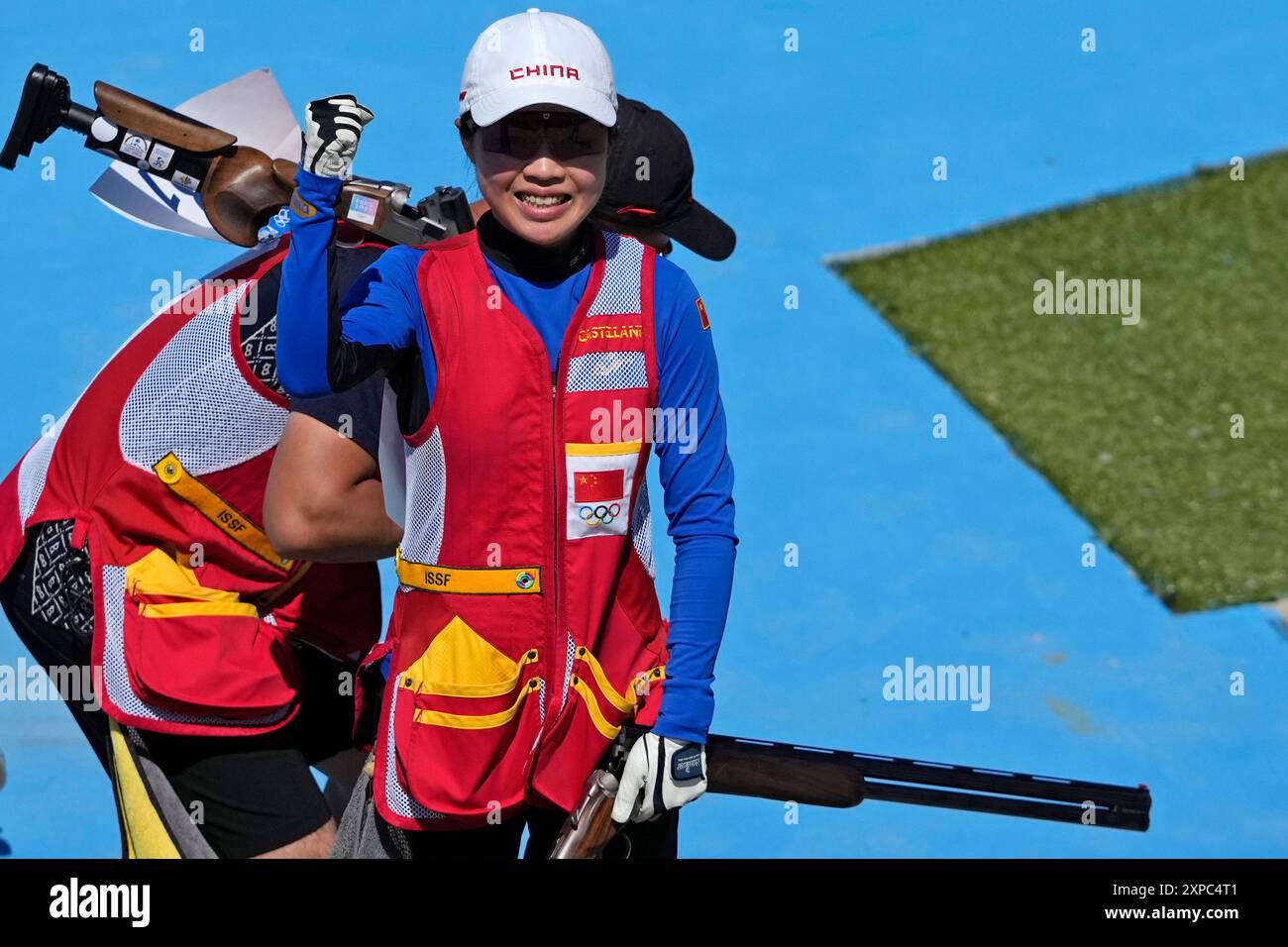 China's Jiang Yiting, right, and China's Lyu Jianlin react after ...