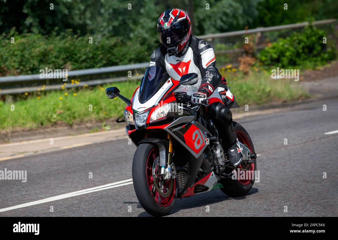 Milton Keynes,UK - July 28th 2024: Man wearing brightly colored full ...