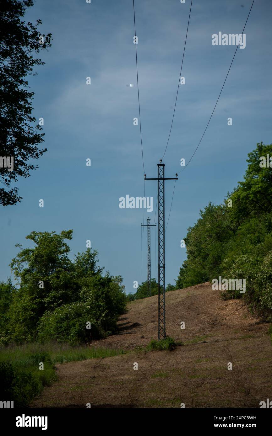 Power line pole, Electrical Pylon, wires, blue sky, clouds Stock Photo ...