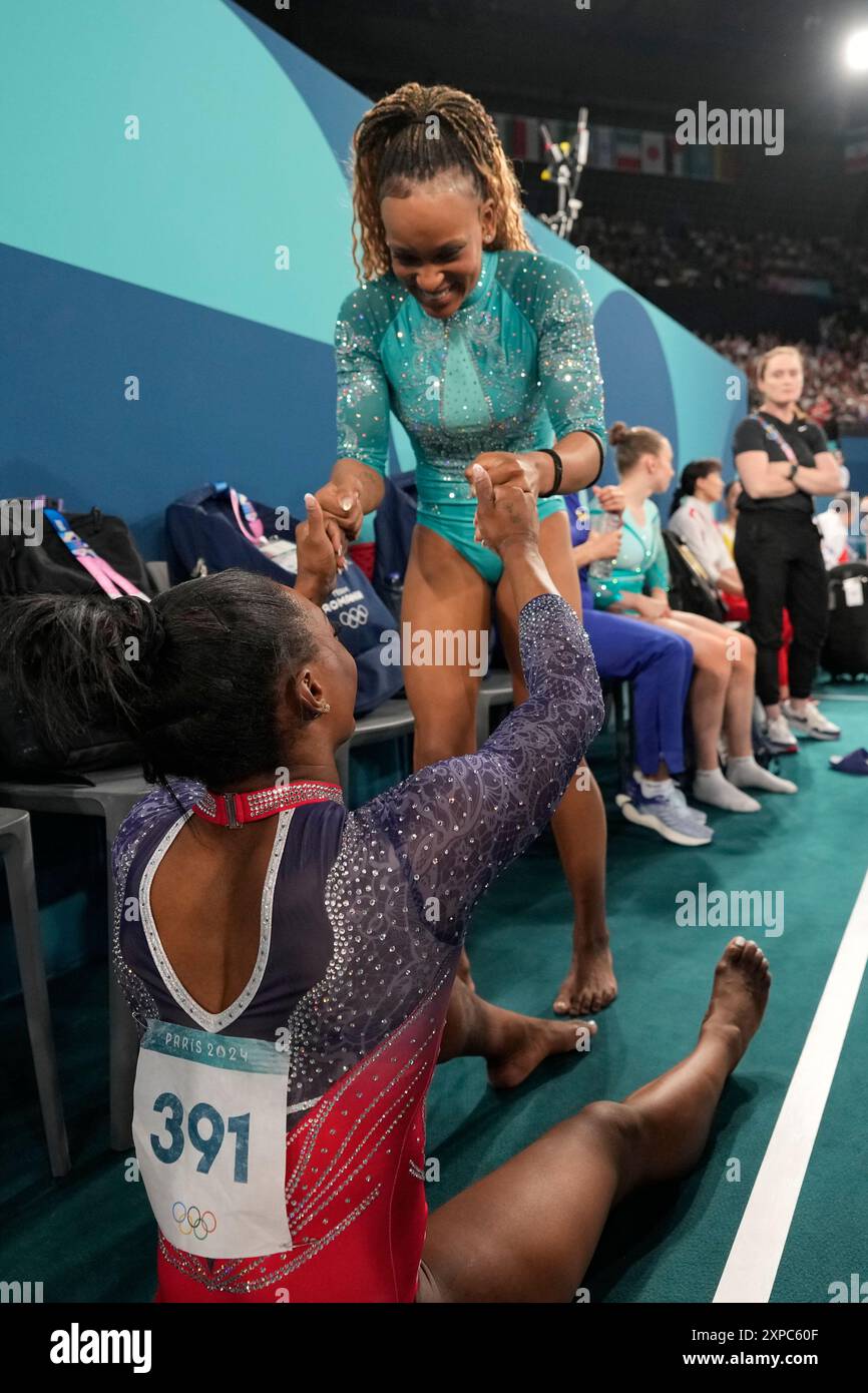 Simone Biles (391), of the United States, greets Rebeca Andrade, of ...