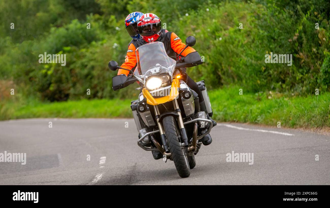 Whittlebury,Norhants,UK - Aug 4th 2024. Man and pillion passenger ...